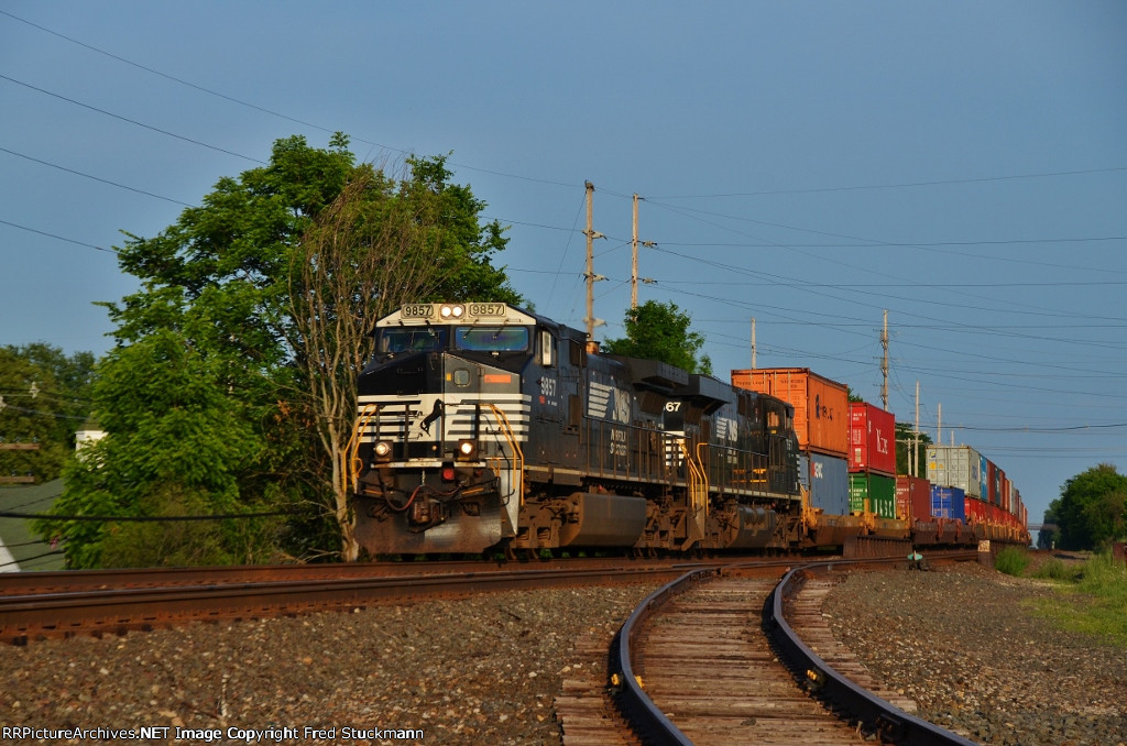 NS 9857 runs into the sunset.